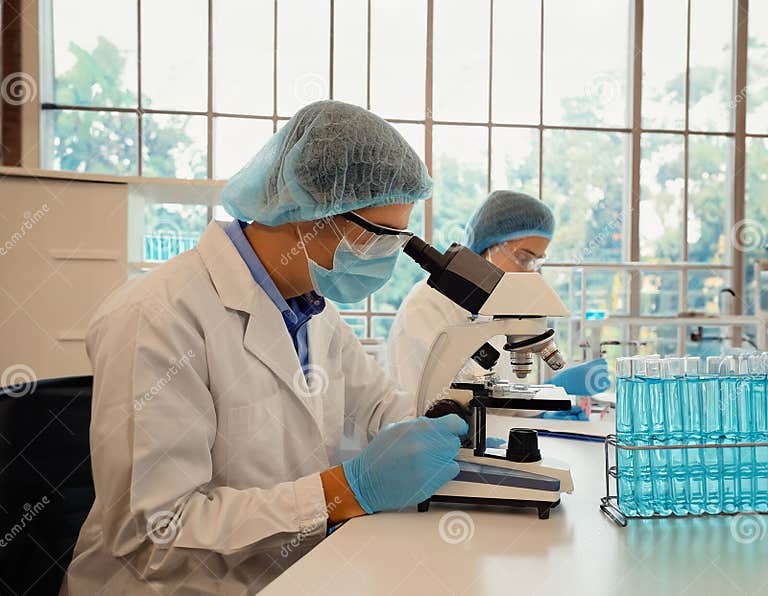 Illustration of Scientist Dressed in Protective Gear in a Lab Coat ...