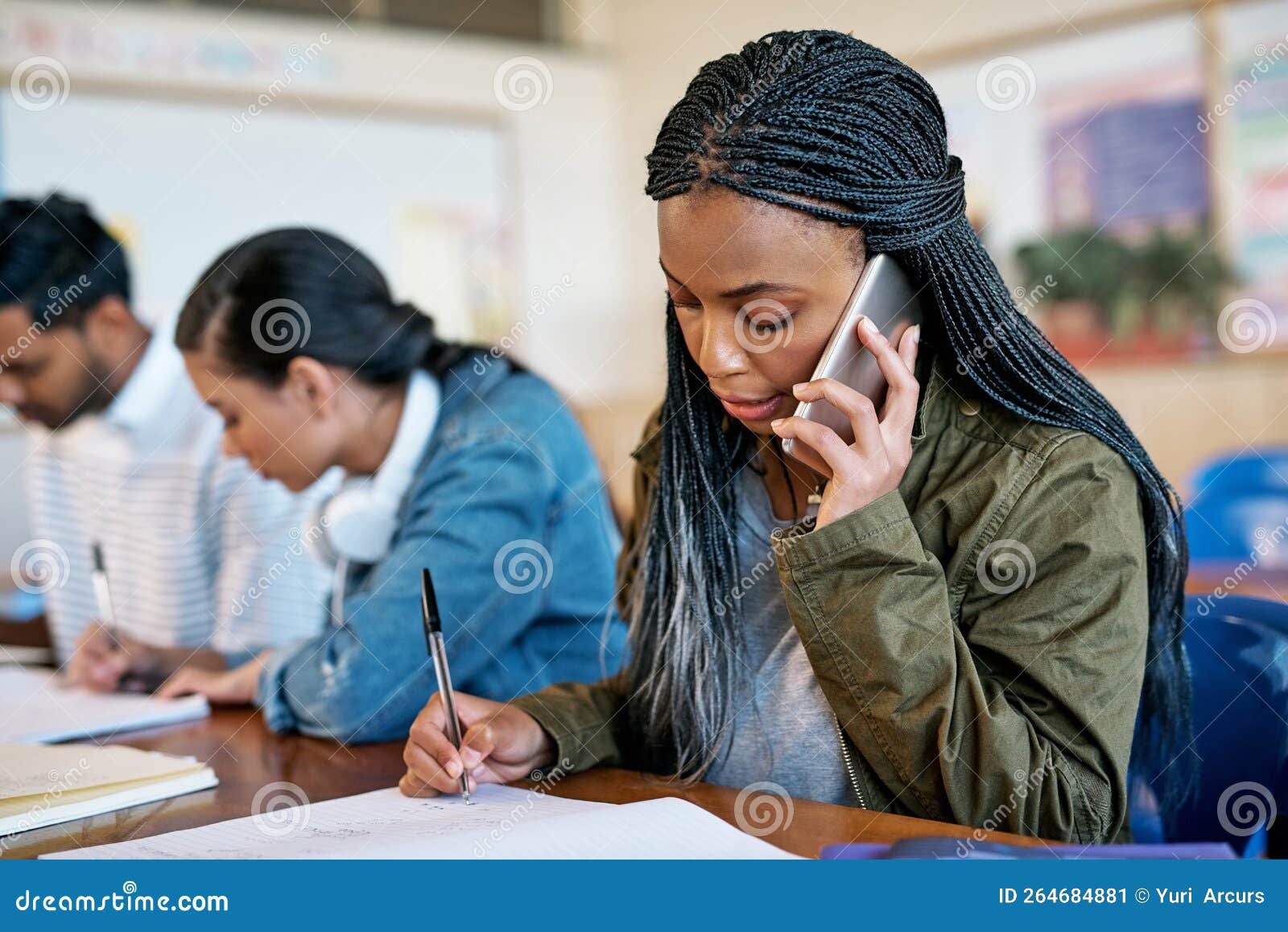 Im in Class...an Attractive Young University Student Taking a Phonecall ...
