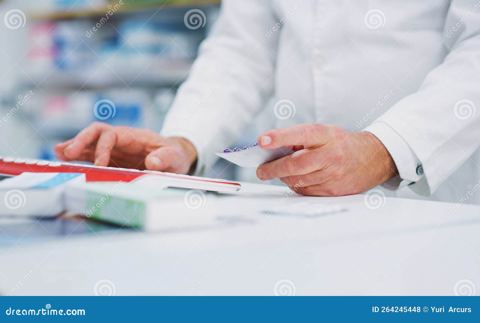 Im Extra Careful when Distributing Dosages. a Pharmacist Holding ...