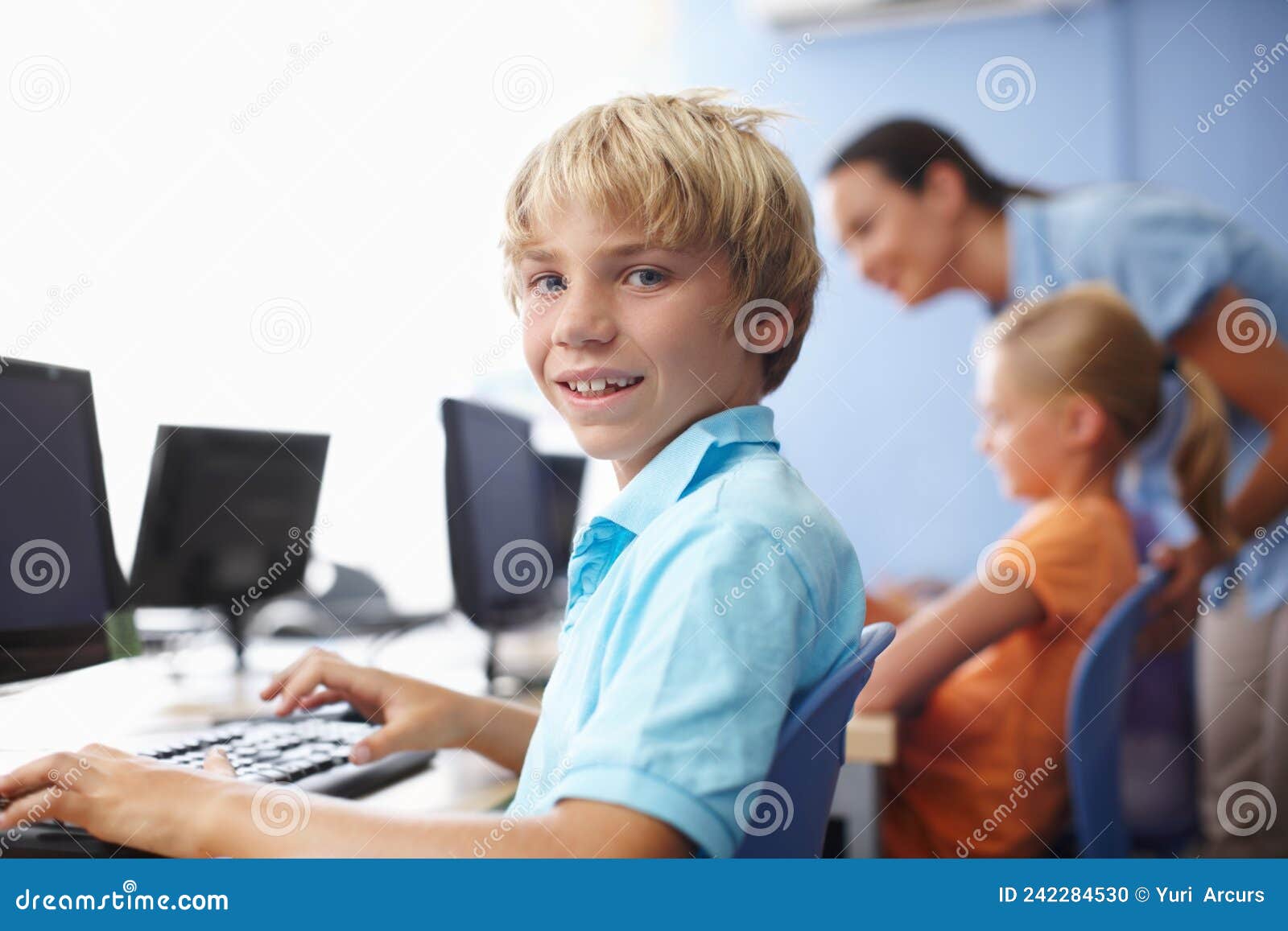 Im Good at Computer Studies. Portrait of a Cute Schoolboy in Computer ...