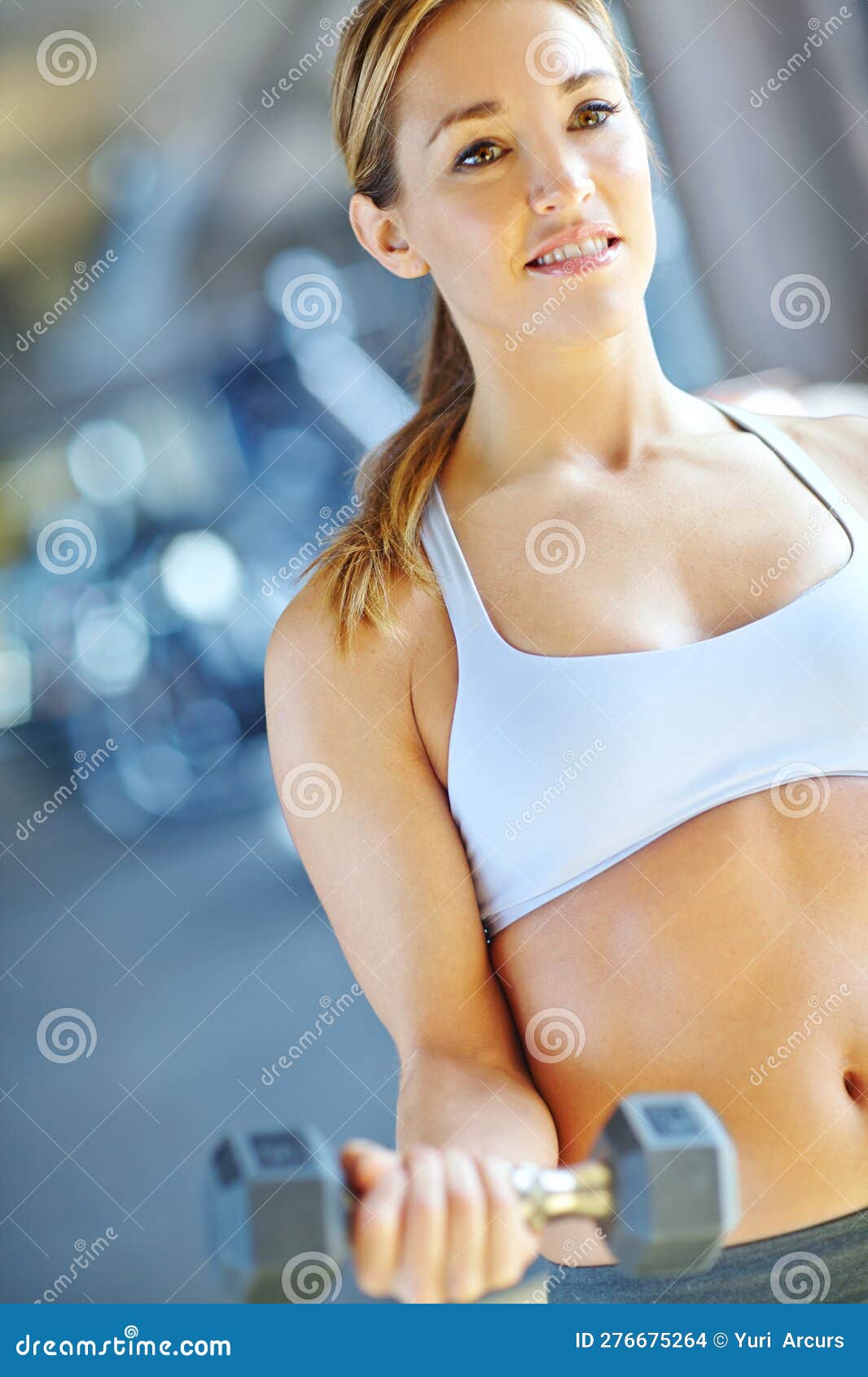 Im Making Great Progress A Beautiful Young Woman Working Out At The