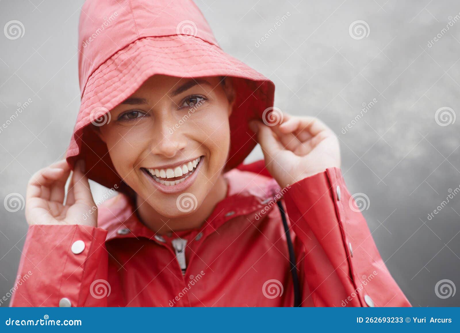 Im Ready for the Rain. an Attractive Young Woman Standing in the Rain ...