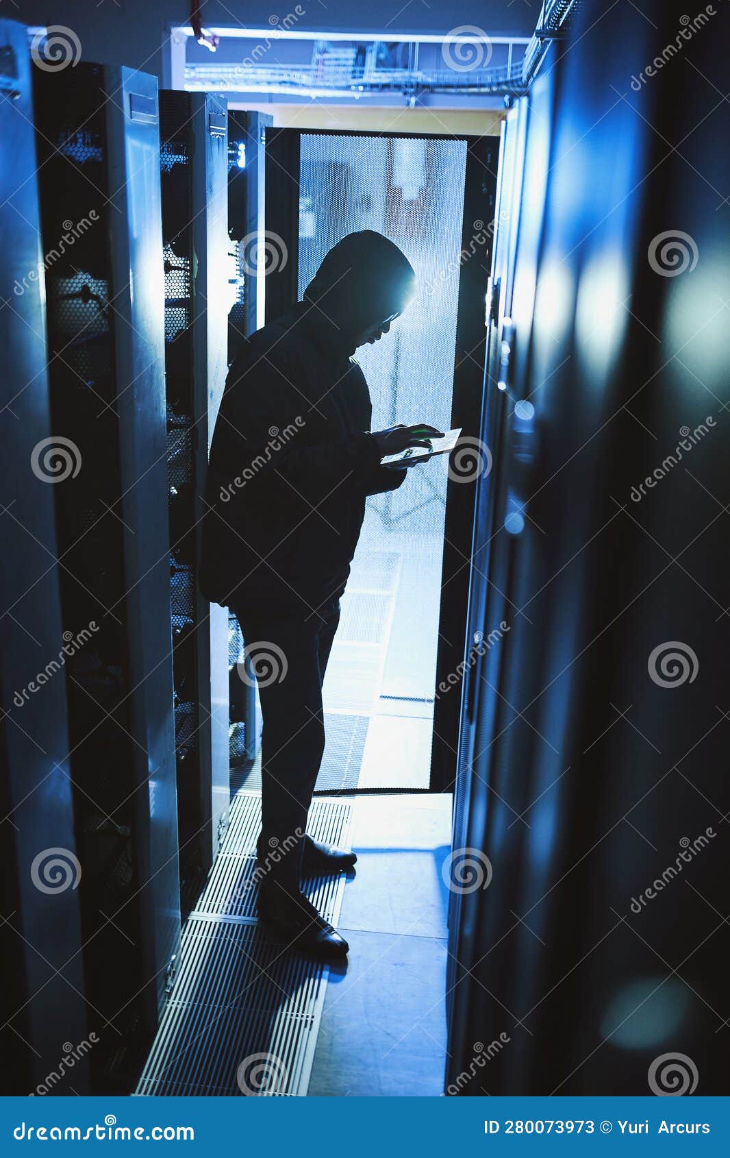 Im about To Score Big. a Hacker Using a Digital Tablet in a Server Room ...