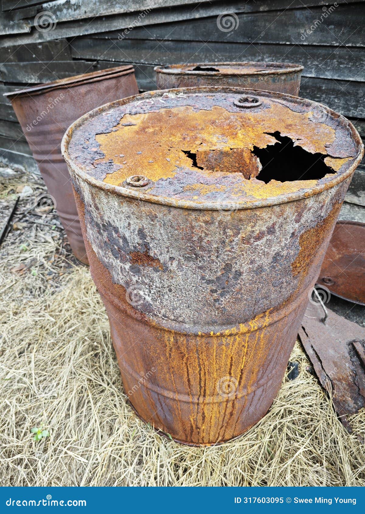 Abandoned Empty and Rusty Metal Barrel Left at the Junkyard. Stock ...