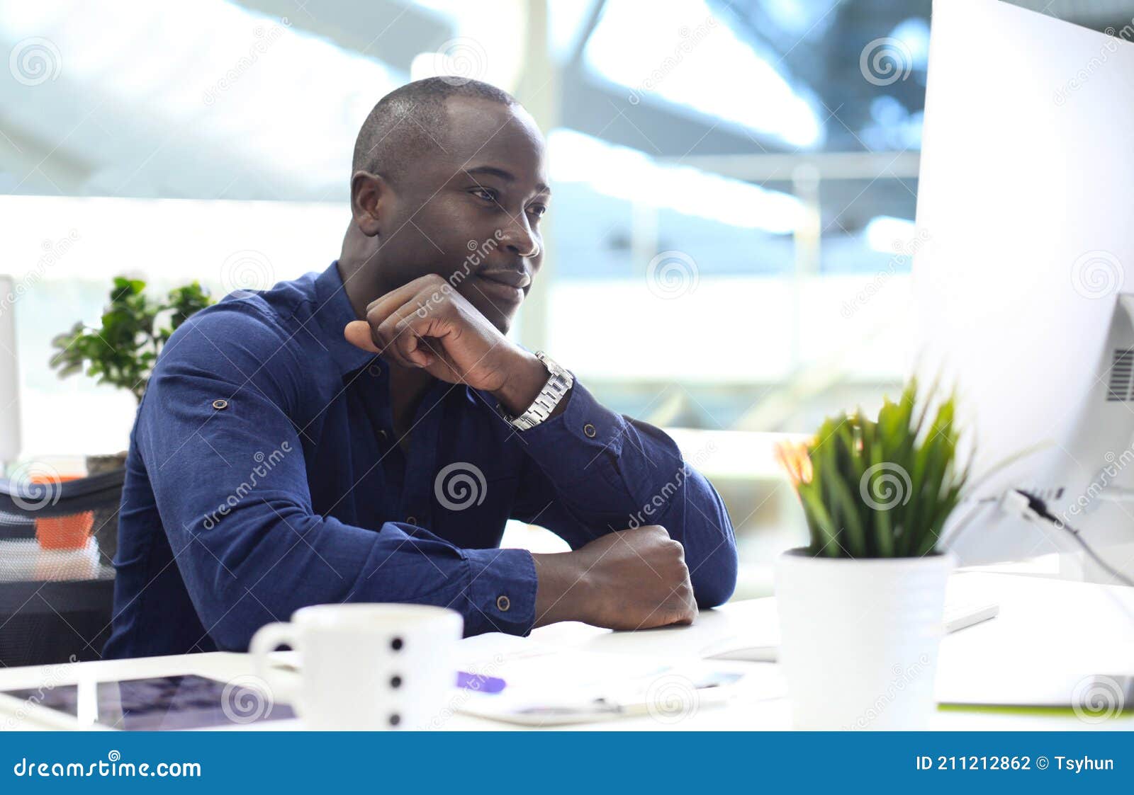 Image of African American Businessman Working on Computer Stock Photo ...