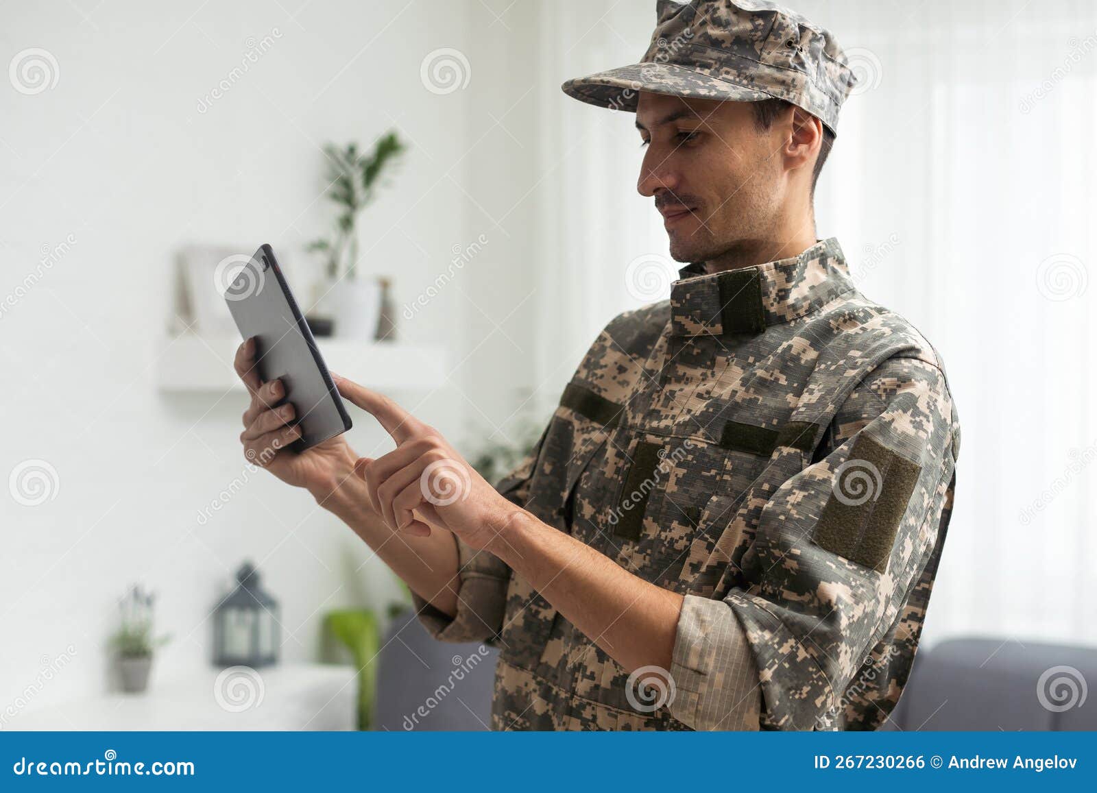 Image of Army Soldier Using Digital Tablet Against White Background ...