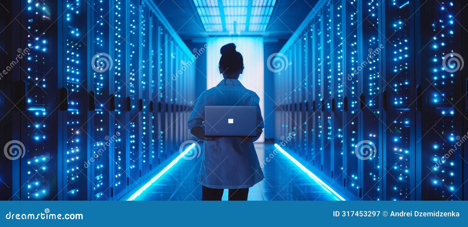 Image of an Asian it Specialist Seated at His Laptop in a Data Center ...
