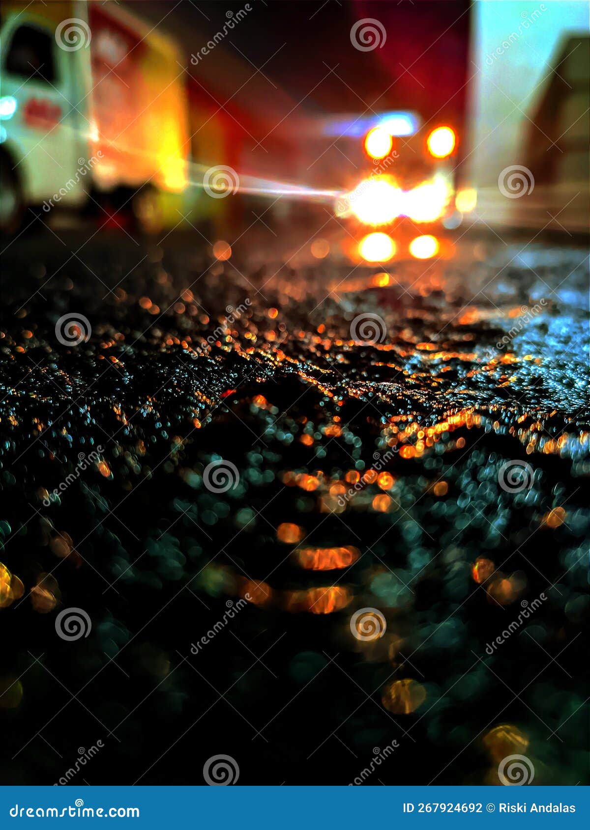 Image of Asphalt Road after Rain and Highlighted Car Lights Stock Photo ...