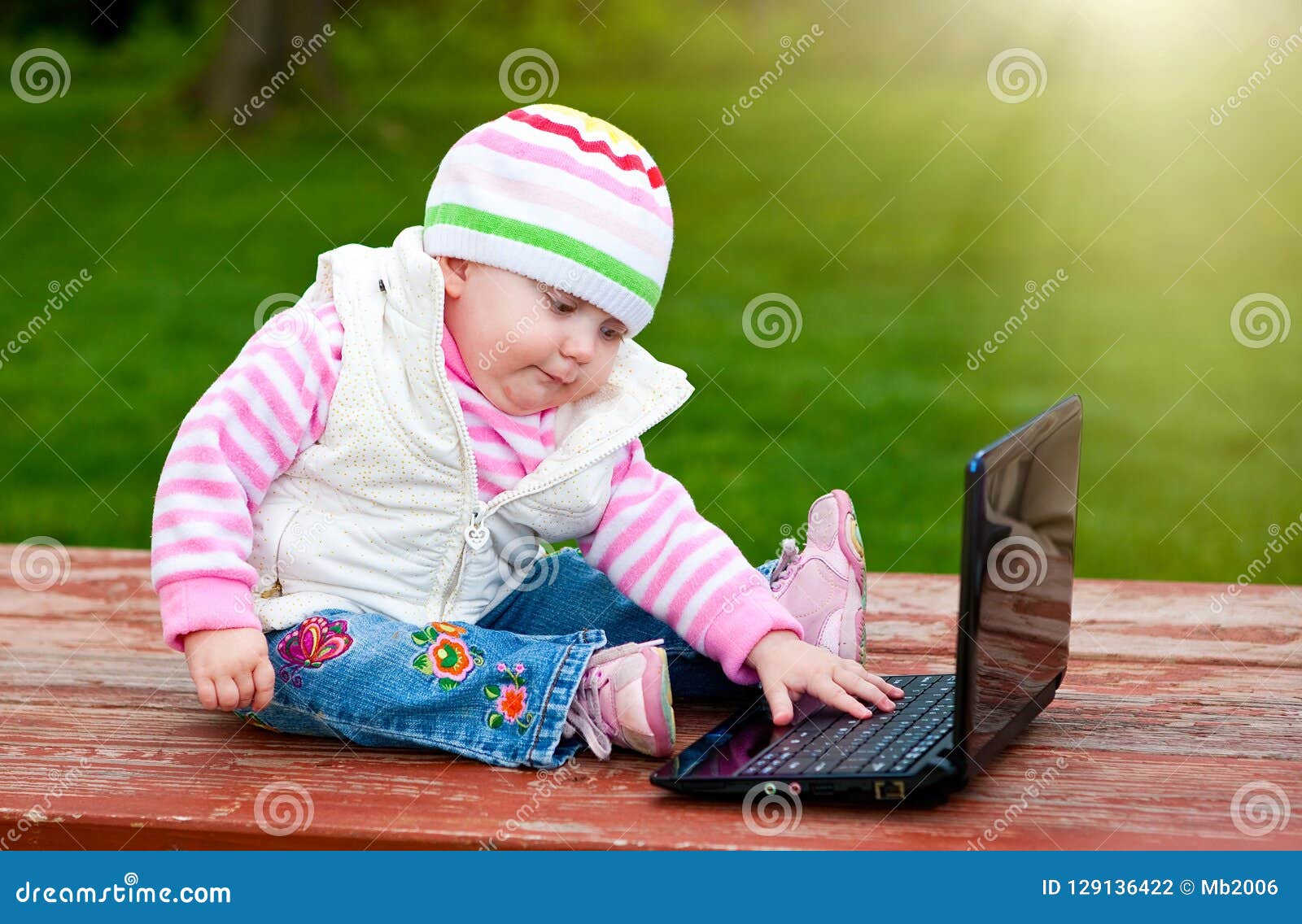 Image of the Baby Playing with Laptop Computer Stock Photo - Image of ...
