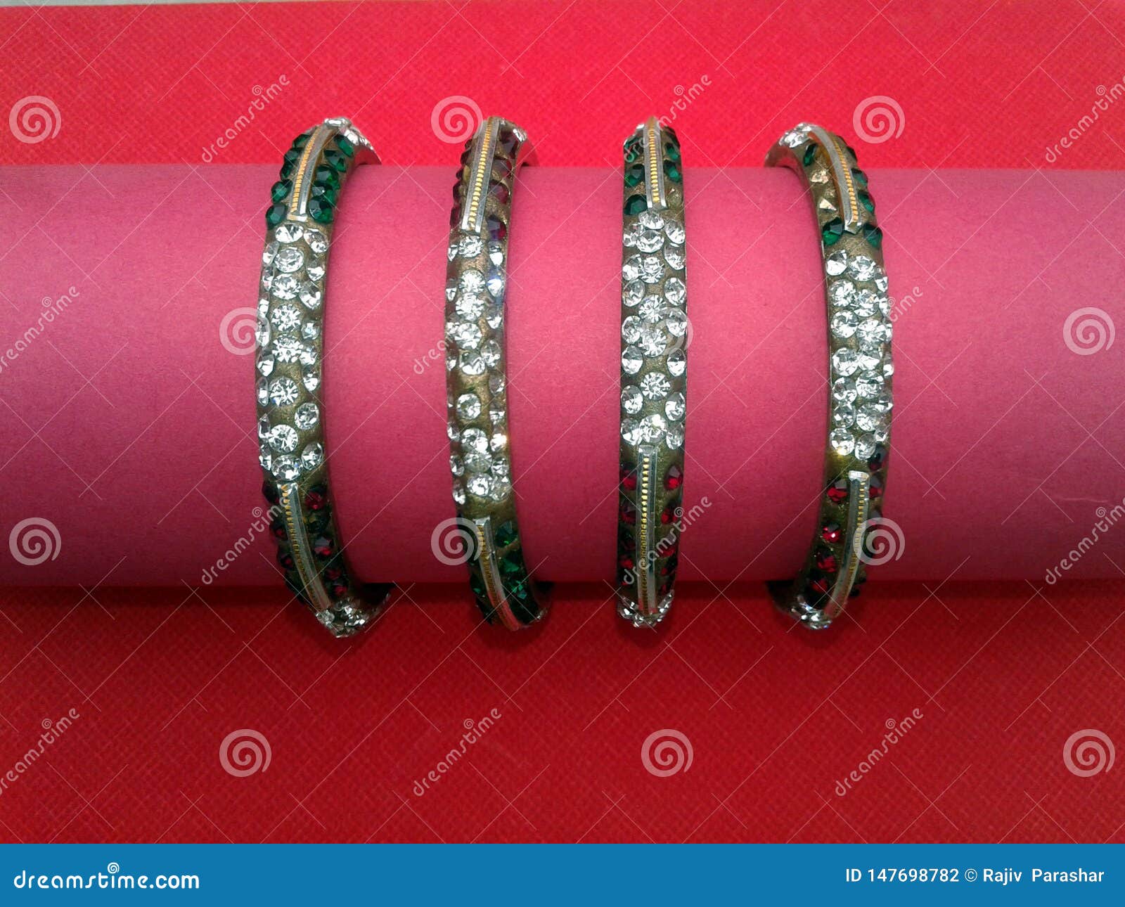 Indian Bangles with Unique Colour Combinations on Red Background Stock ...