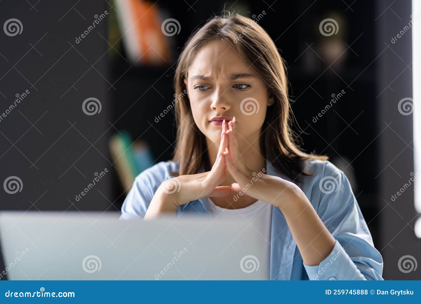 Beautiful Woman Thinking while Sitting at Table in Office Stock Photo ...