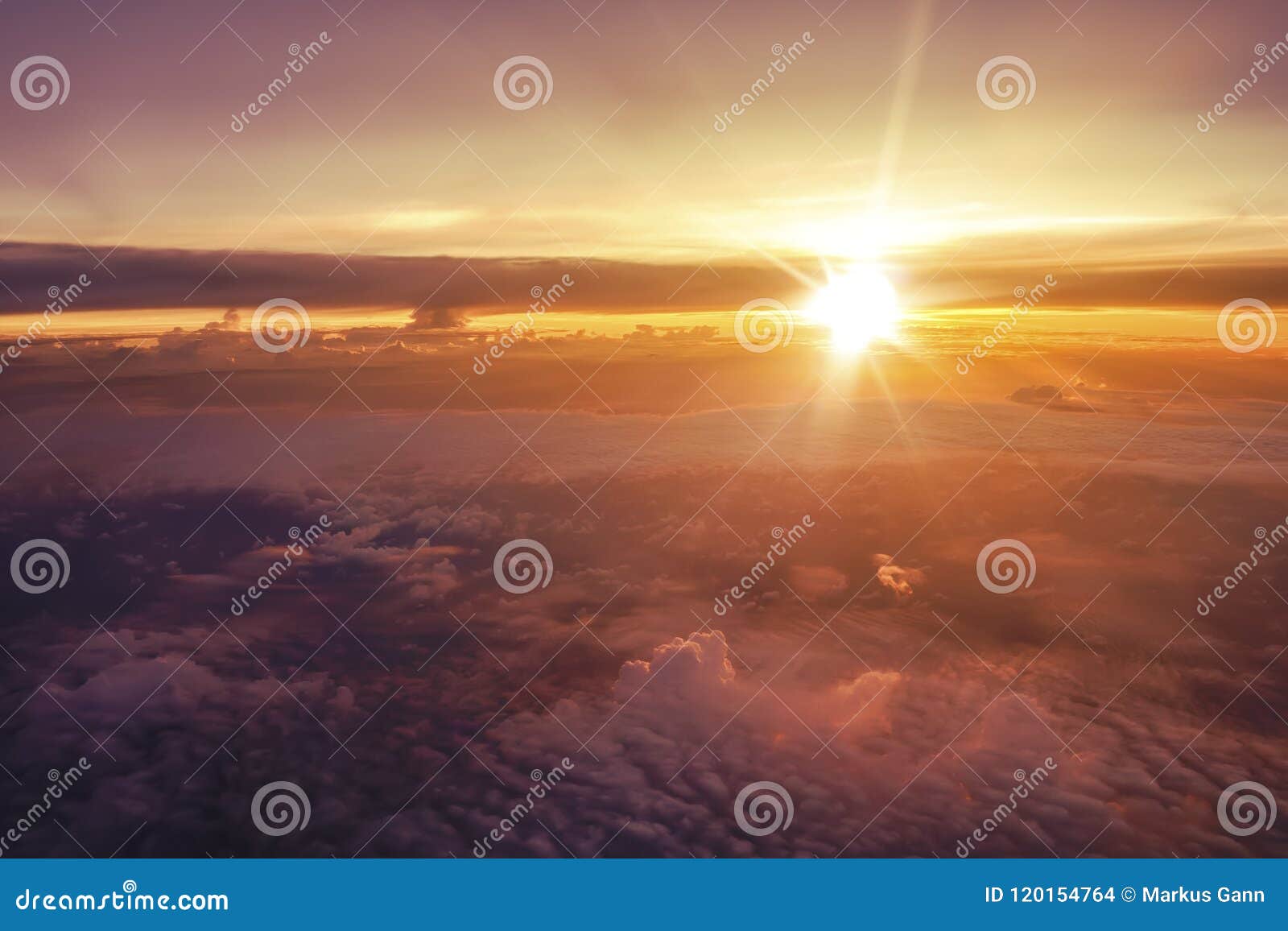 Sunset over the clouds stock photo. Image of atmosphere - 120154764