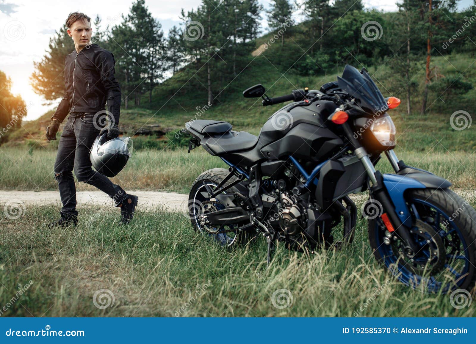 Image of Biker and Motorcycle on the Country Road. Stock Photo - Image ...
