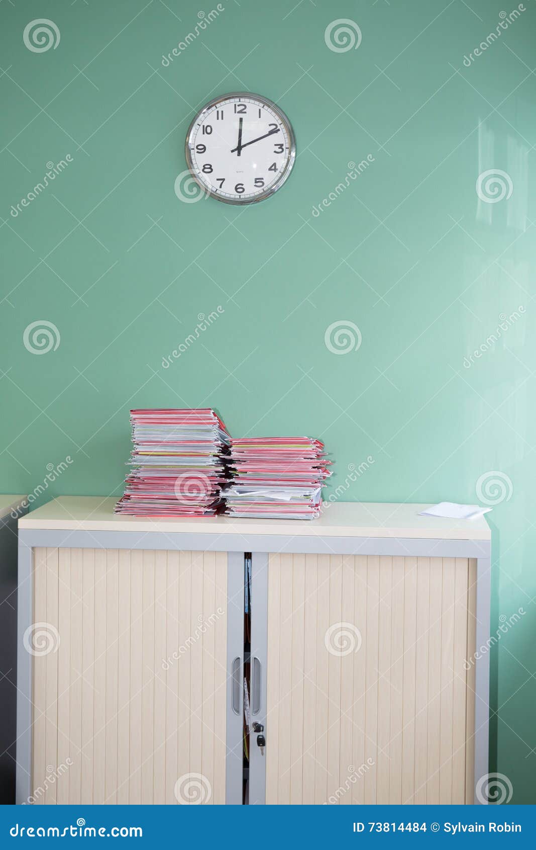 Image of Board with Documents and Clock in Office Stock Photo - Image ...
