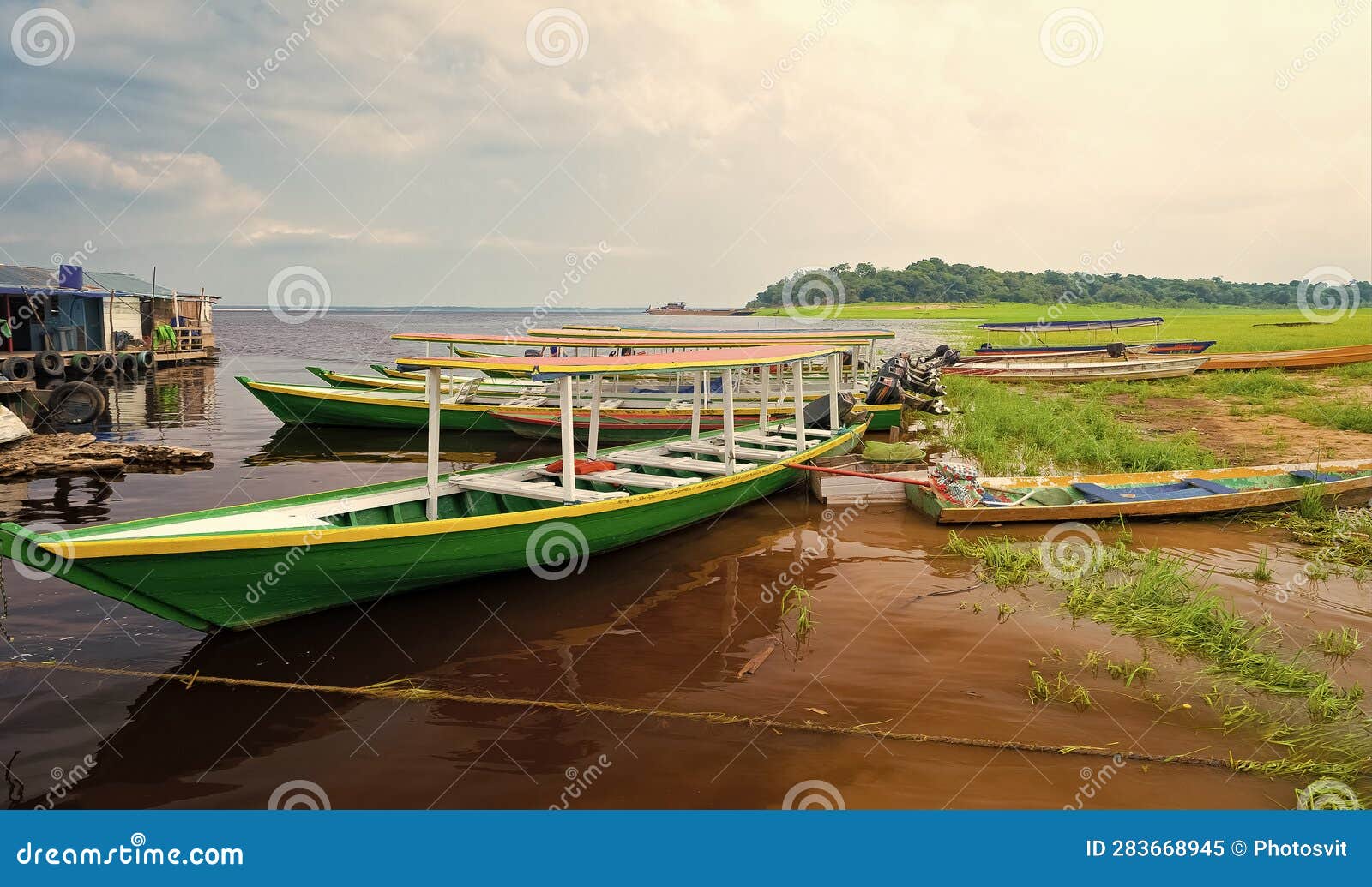 Image of Boat at Riverside. Boat at Riverside Nature. Wooden Boat at ...