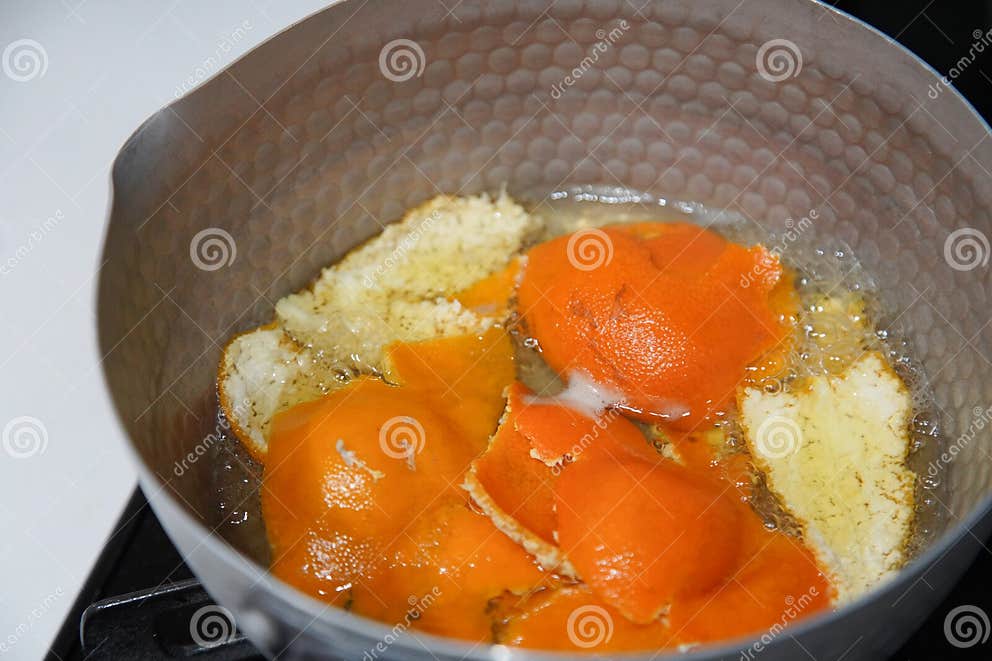 Boiling mandarin peels stock photo. Image of steam, freshness - 324529578