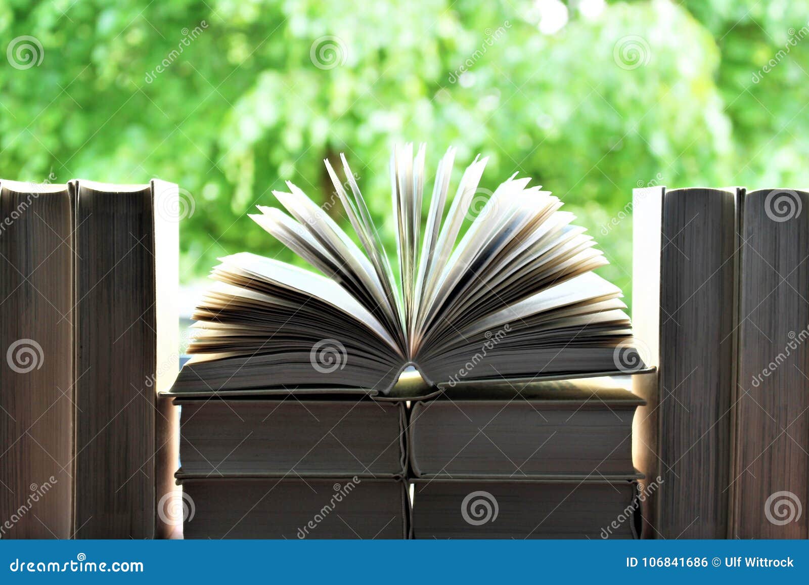 An Image of Book in Front of a Open Window Stock Photo - Image of ...