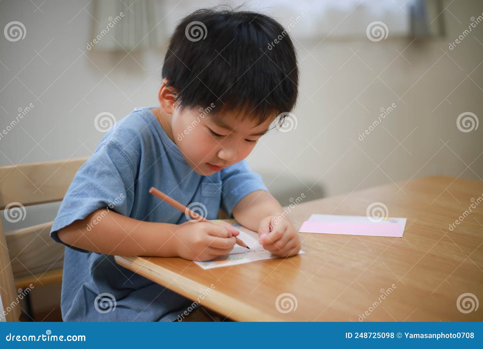 Boy writing a letter stock photo. Image of copy, indoors - 248725098