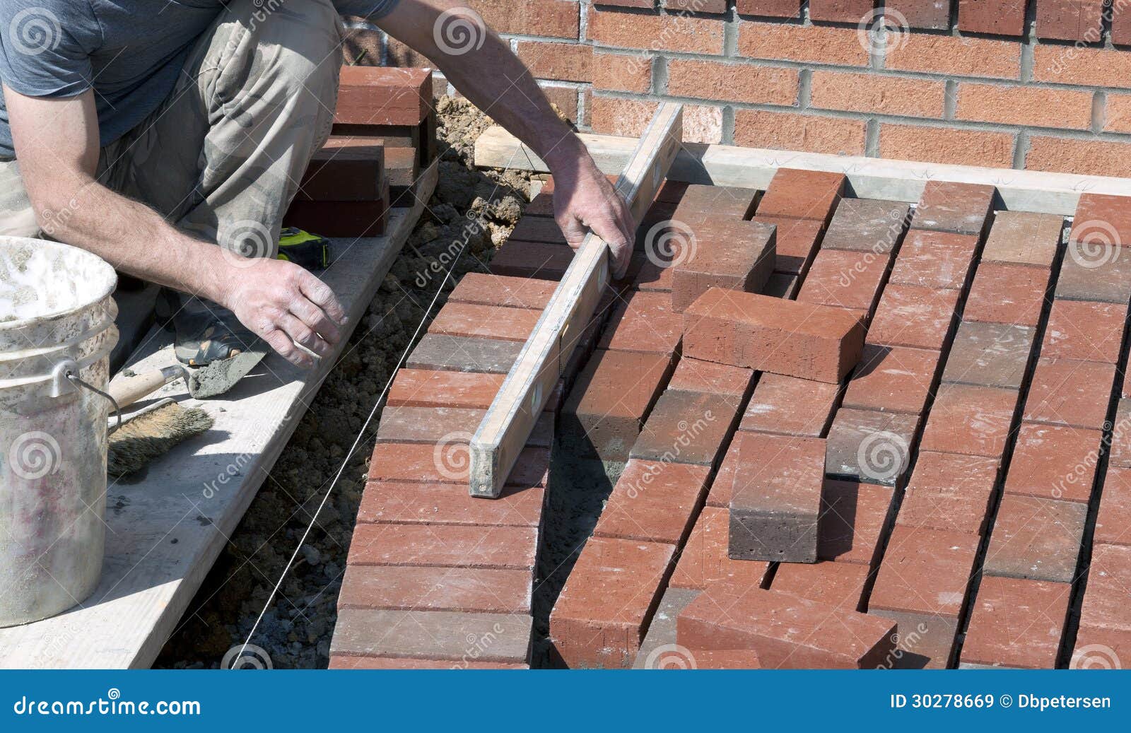 Brick Mason Laying a Sidewalk Stock Image - Image of craftsman ...