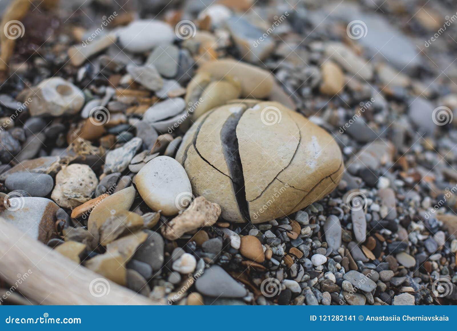 Image of the Broken Sea Rock on the Sand Beach Background. Pebble ...