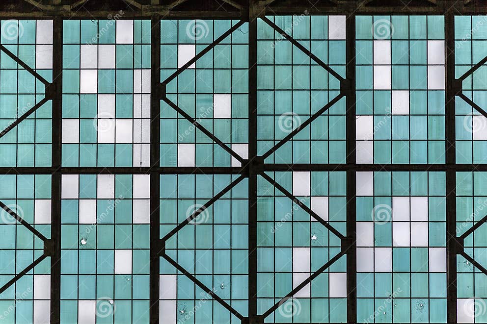 The Image is of a Building with a Blue and White Patterned Glass ...