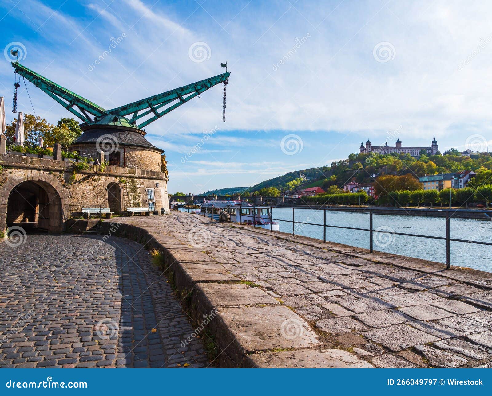 Image of a Building on the Coast of the River and a Castle in the City ...