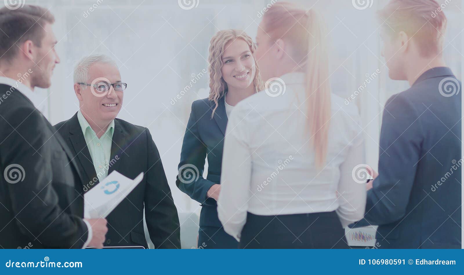 Image of Business Partners Discussing Documents and Ideas at Mee Stock ...