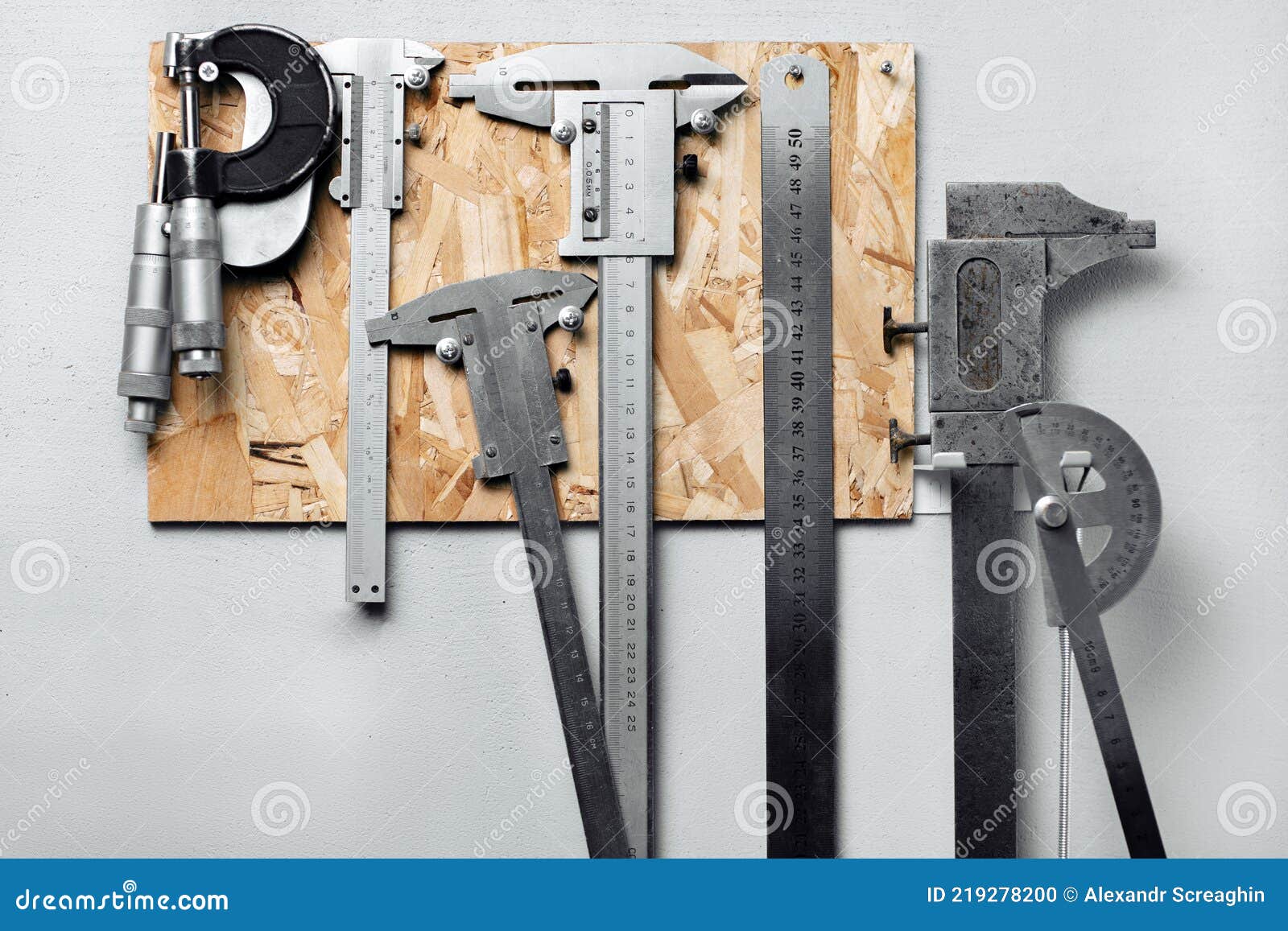 Image of Calipers and Micrometers on the Wall. Instruments for Accurate ...