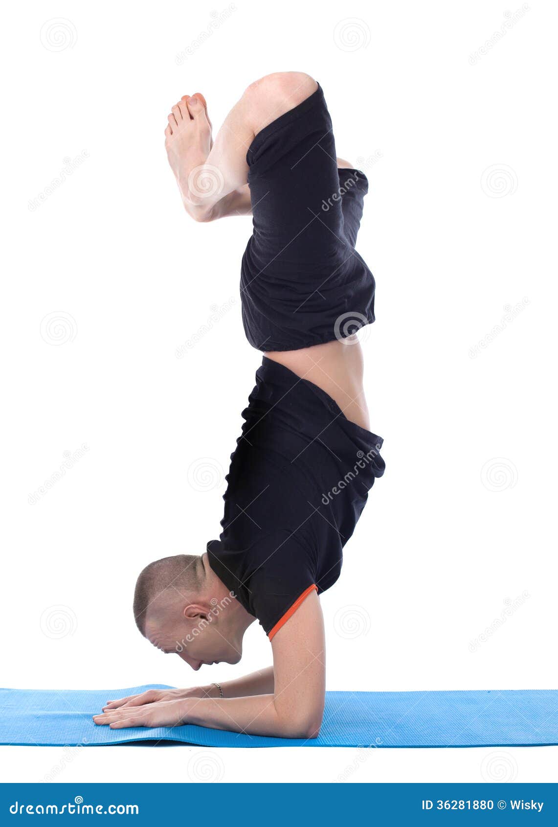 Image of Calm Man Doing Yoga Handstand Stock Photo - Image of ...