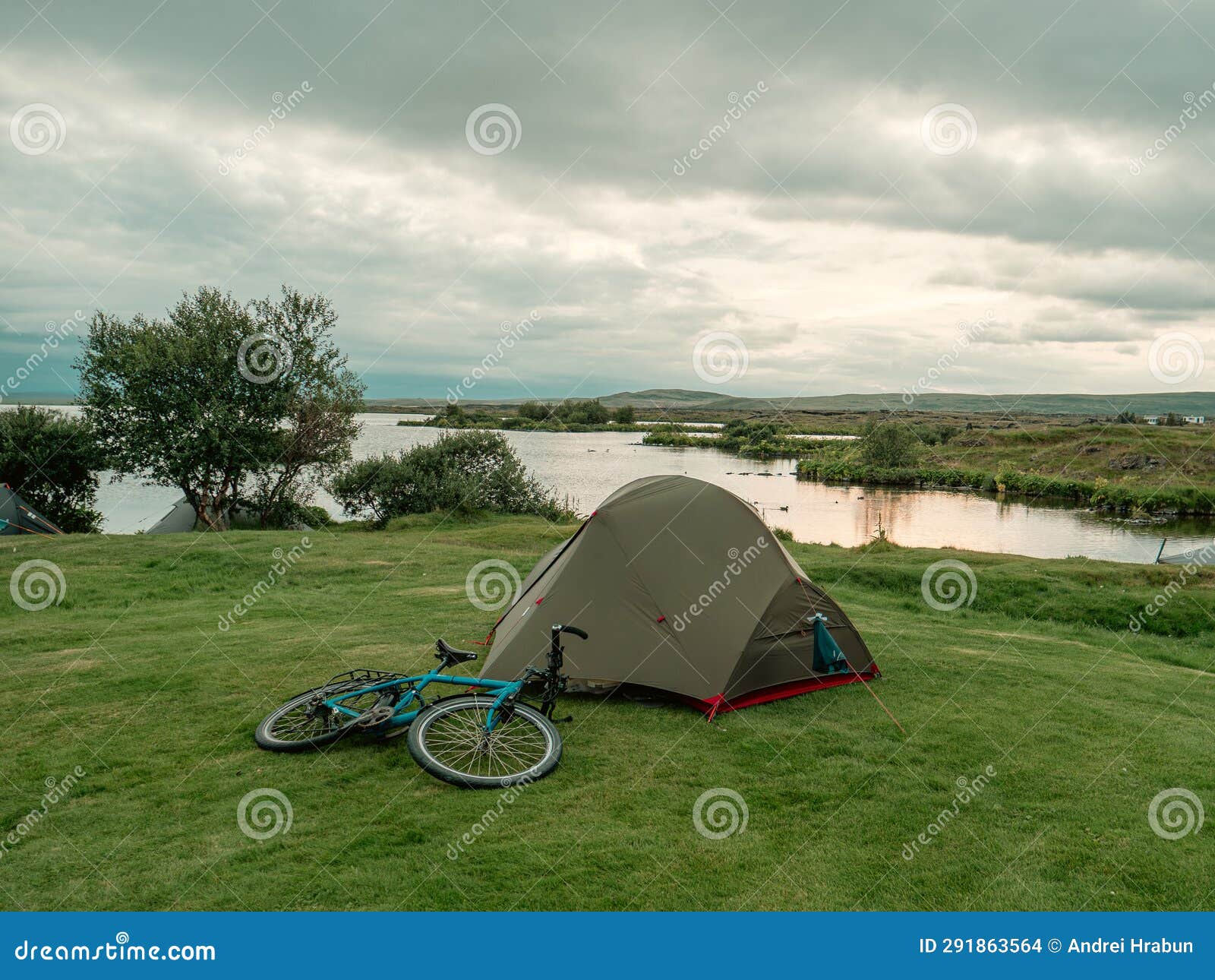 Image of Camping Side with Tents and Bicycles at the Lake Stock Photo ...