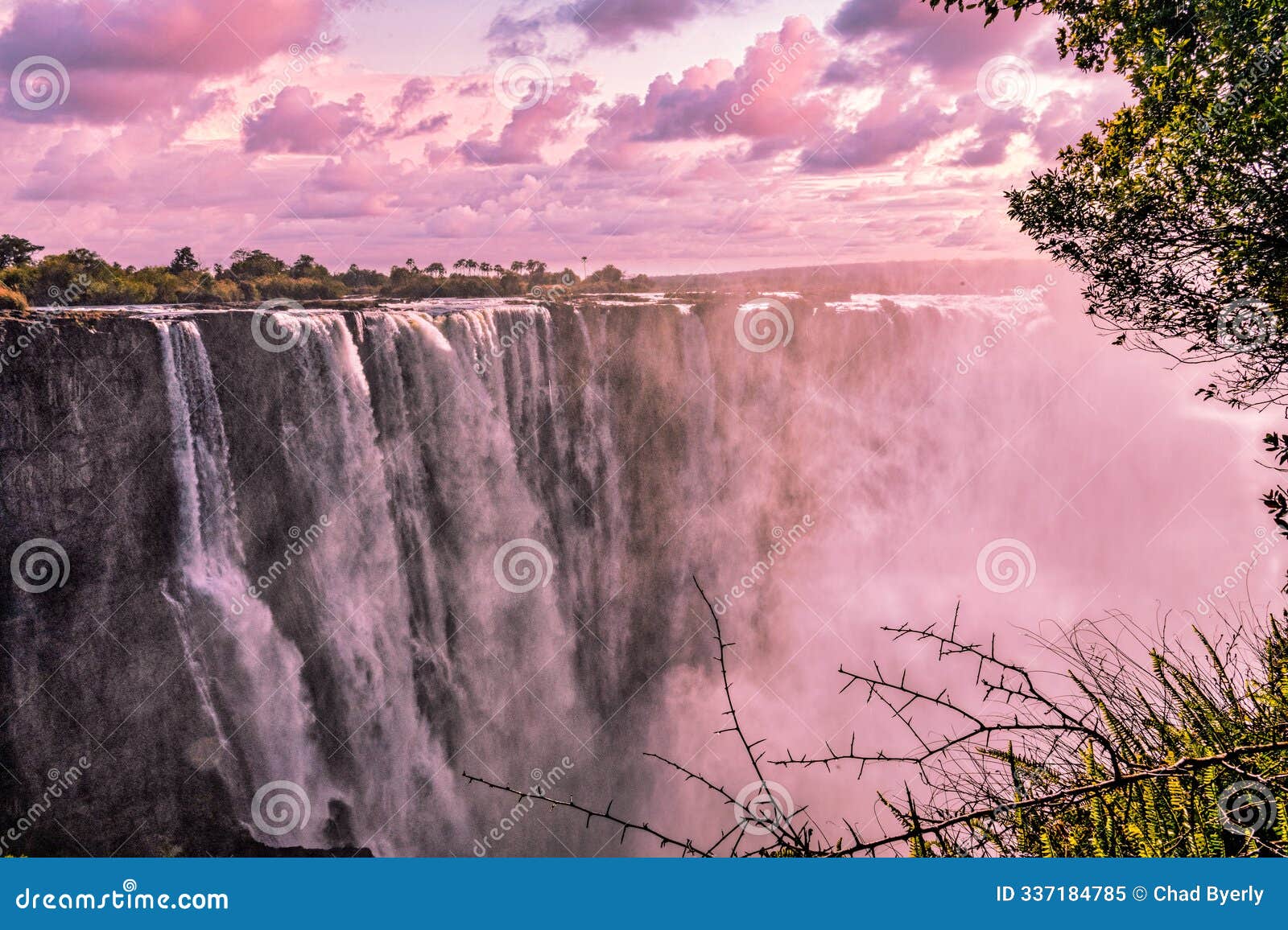 This Image Captures a Stunning Waterfall Cascading Down Rocky Cliffs ...
