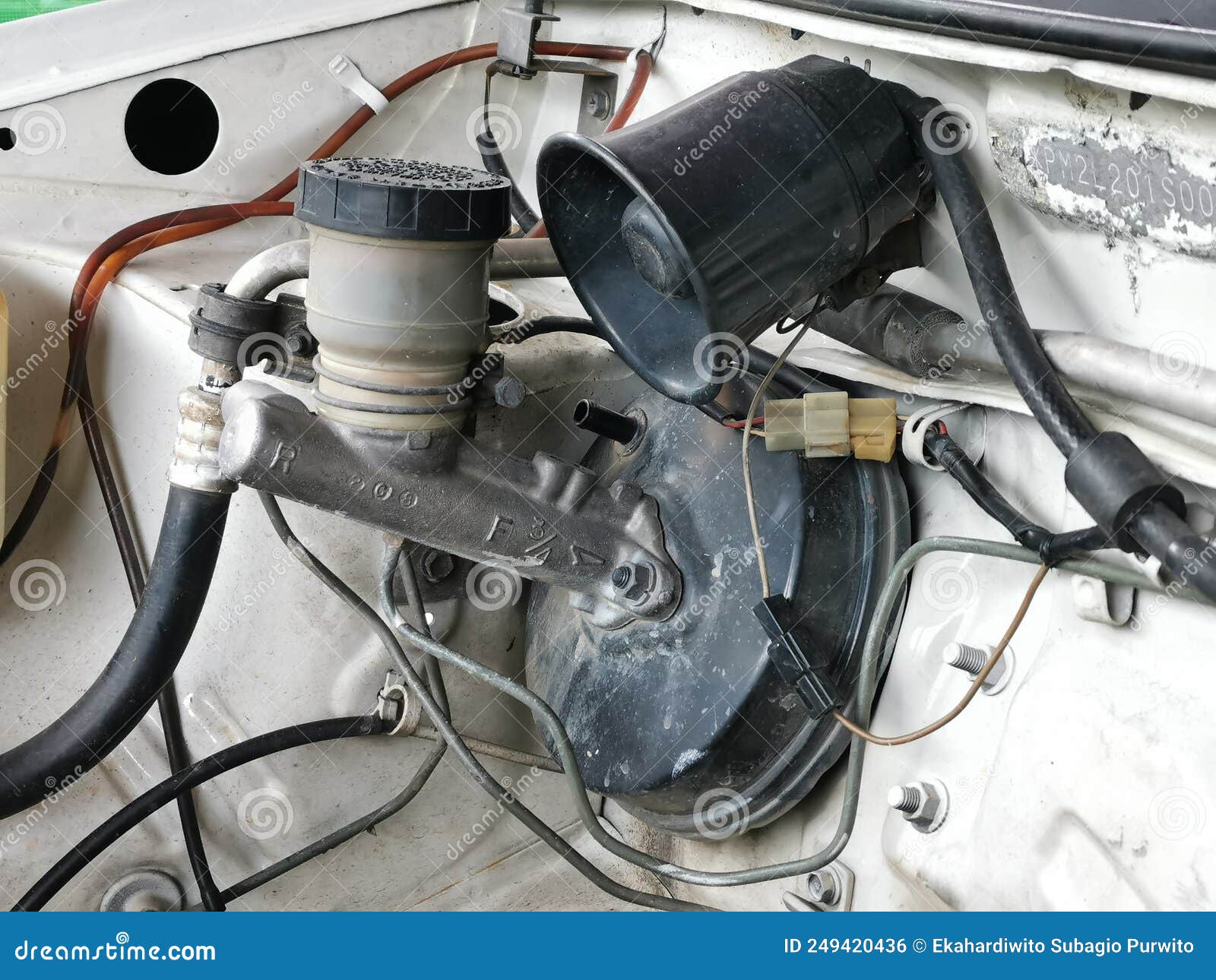 Image of Car Break Pump System and Horn Speaker Mount on Car Engine Bay ...