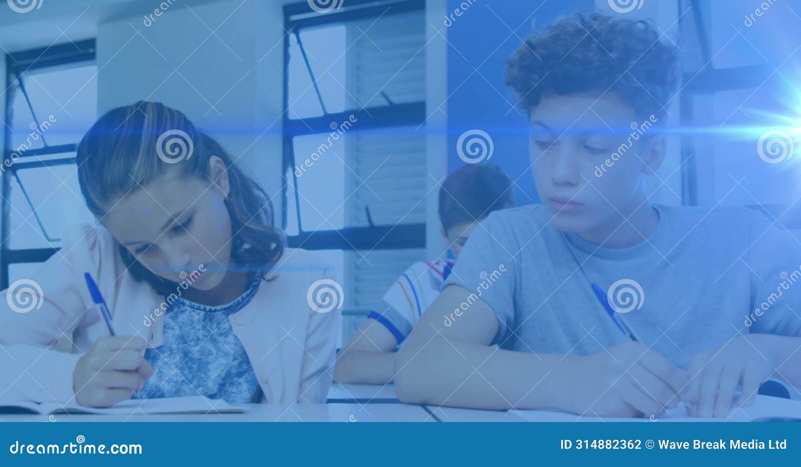 Image of Caucasian Male and Female Students Writing Test at School ...