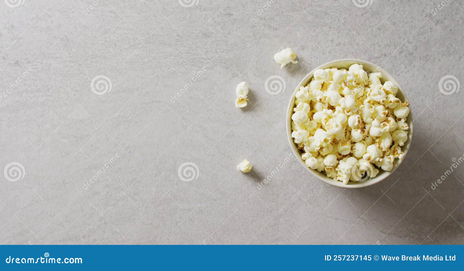 Image of Close Up of Box of Popcorn on Gray Background Stock Image ...