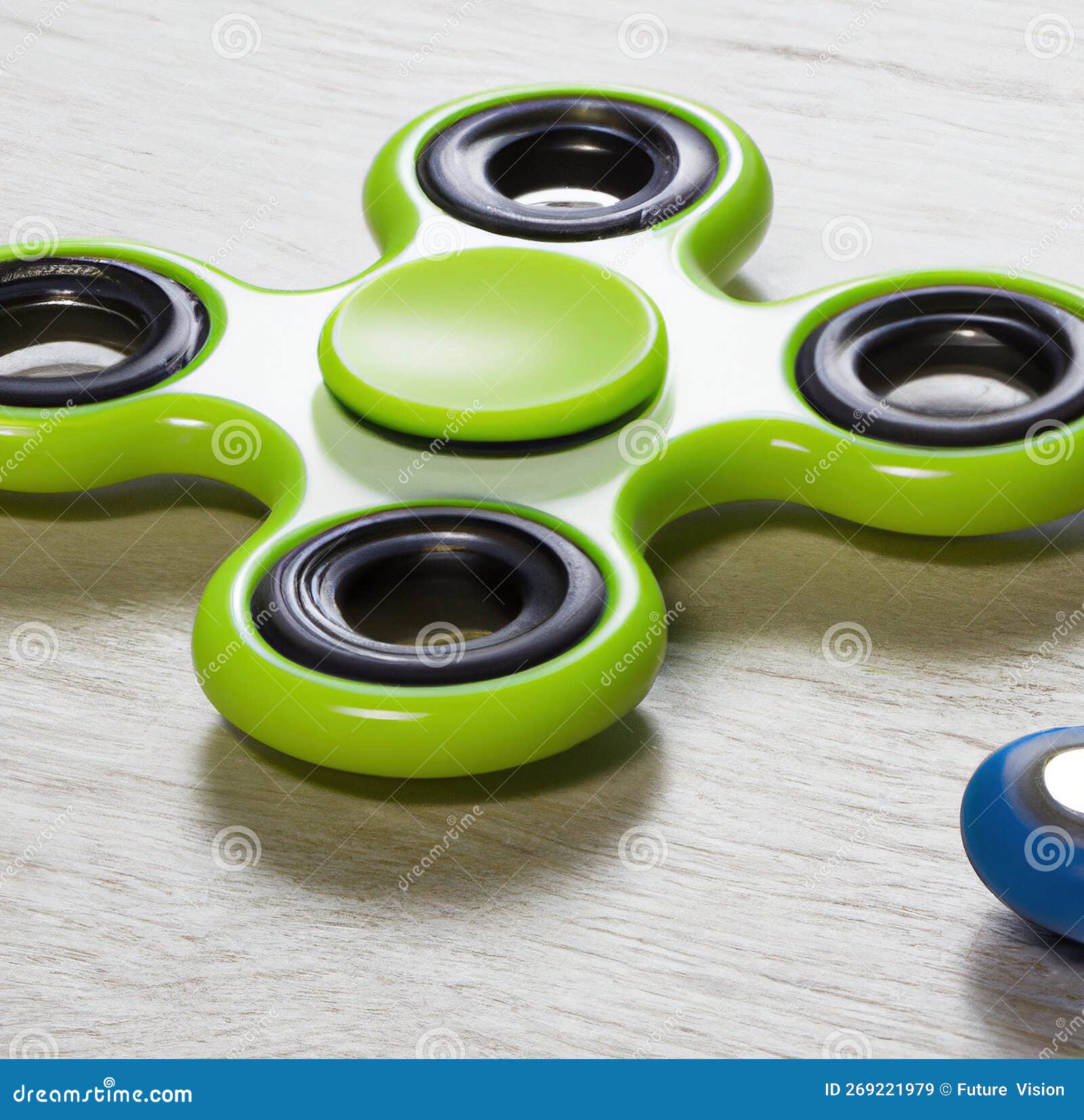 Image of Close Up of Green Fidget Spinner on Grey Background Stock ...