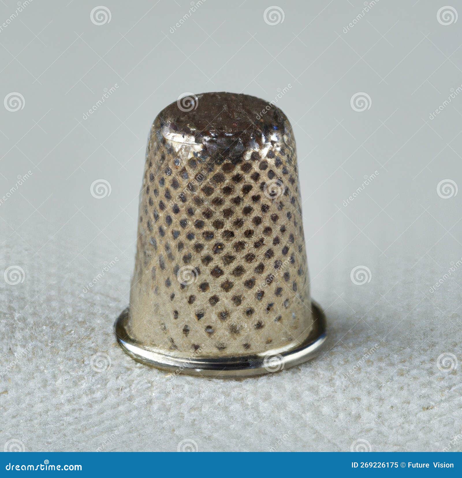 Image of Close Up of Silver Thimble on Grey Patterned Fabric Background ...