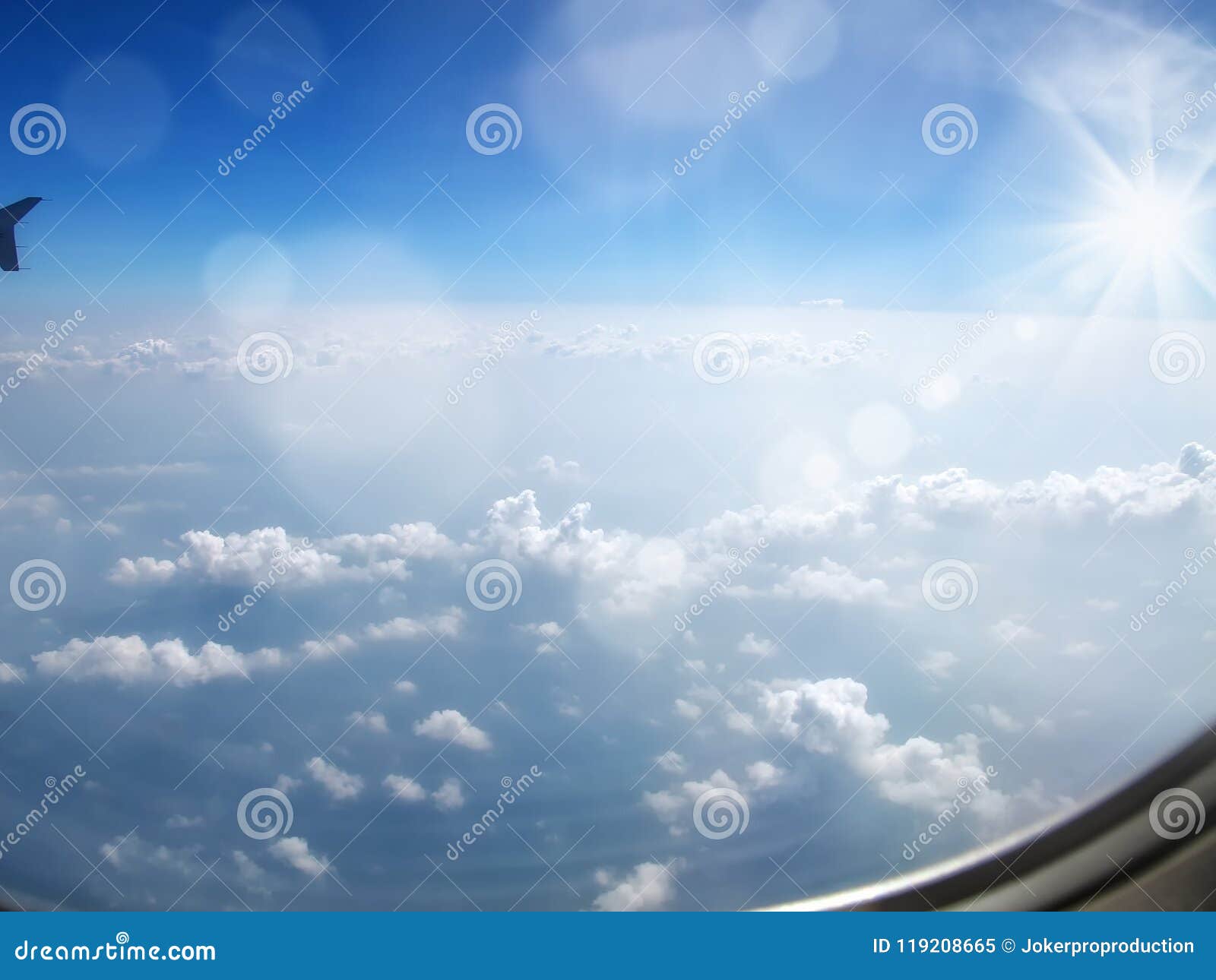 Clouds and Sun from Airplane Window Stock Image - Image of bright ...