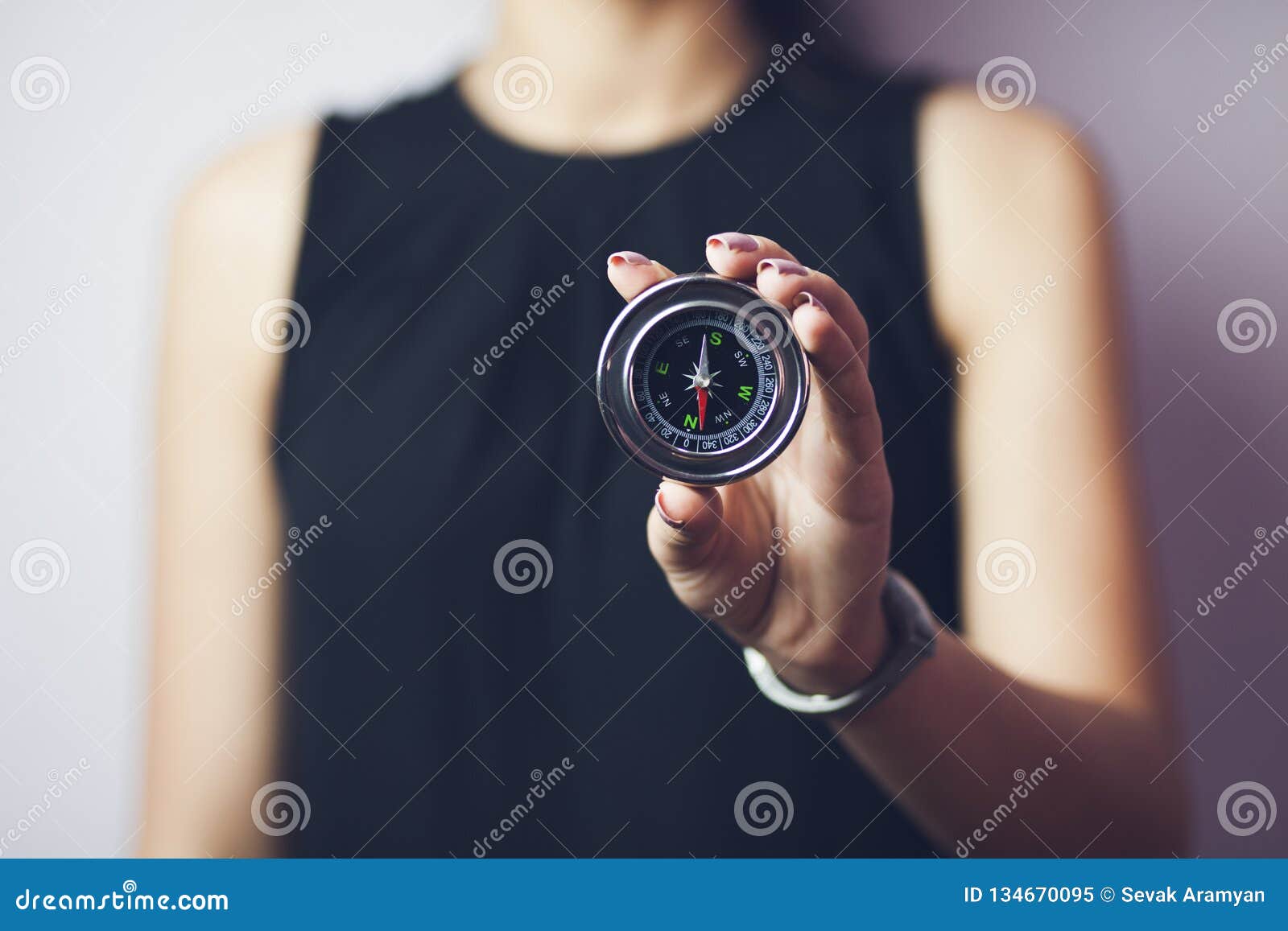 Compass on woman hand stock image. Image of business - 134670095