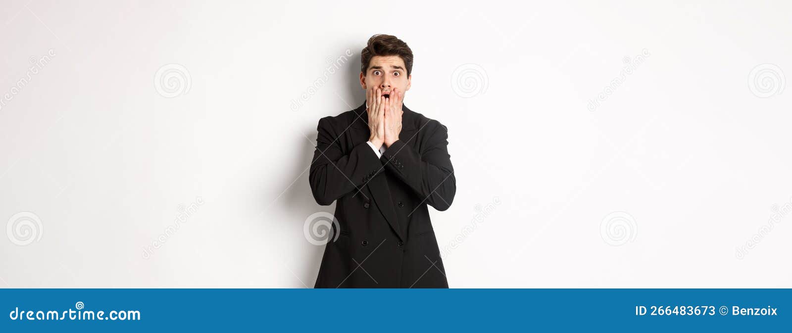 Image of Concerned and Scared Man in Black Suit, Gasping and Looking ...