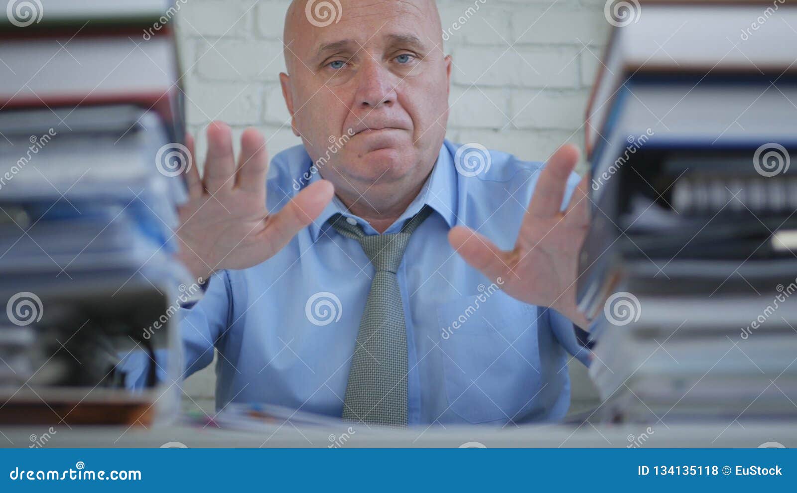 Confident Businessman Presenting His Work in Accounting Archive Room ... Confident Businessman Presenting His Work in Accounting Archive Room ...