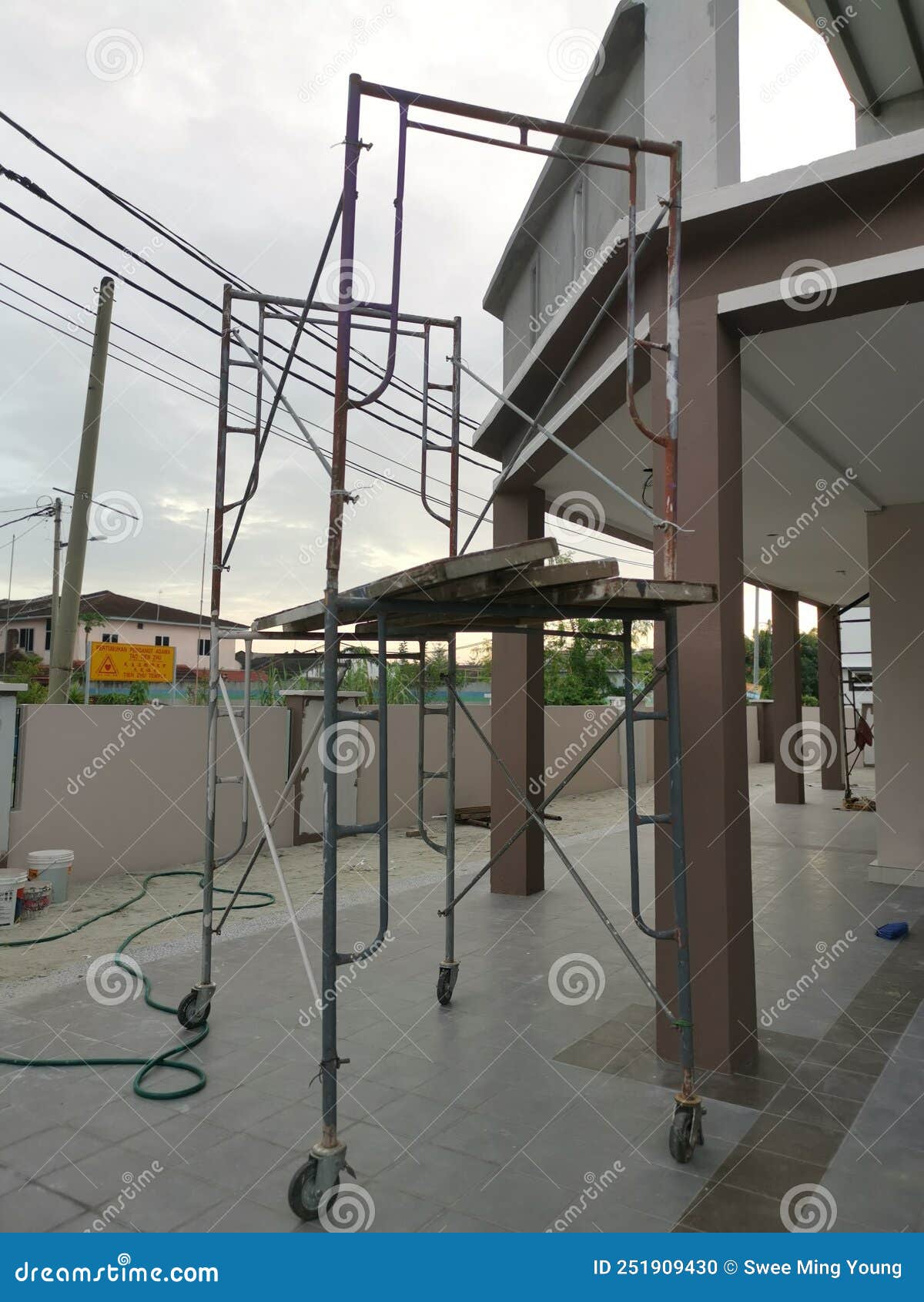 CONSTRUCTION SCAFFOLD Ladder Stacked Outside the Concrete Home Stock ...