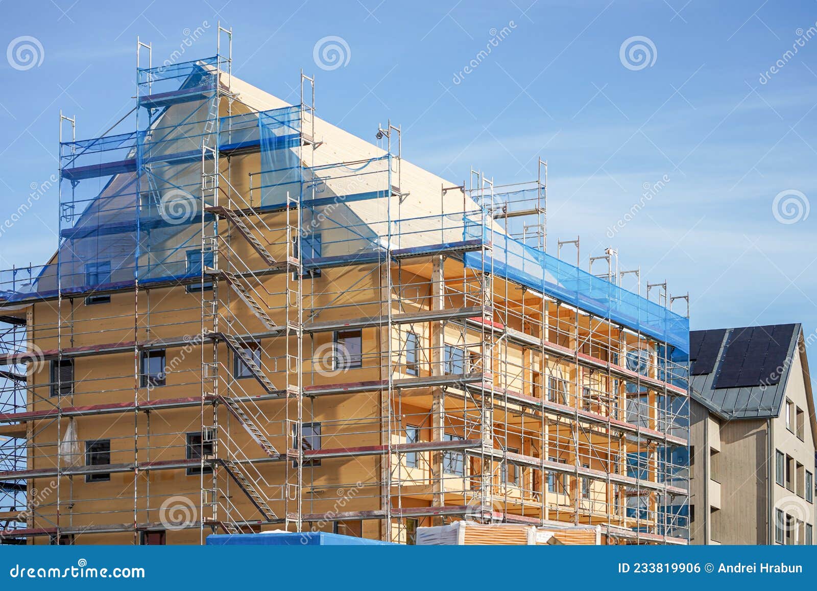 Construction Site of Modern Wooden Apartment House Stock Photo - Image ... Construction Site of Modern Wooden Apartment House Stock Photo - Image ...