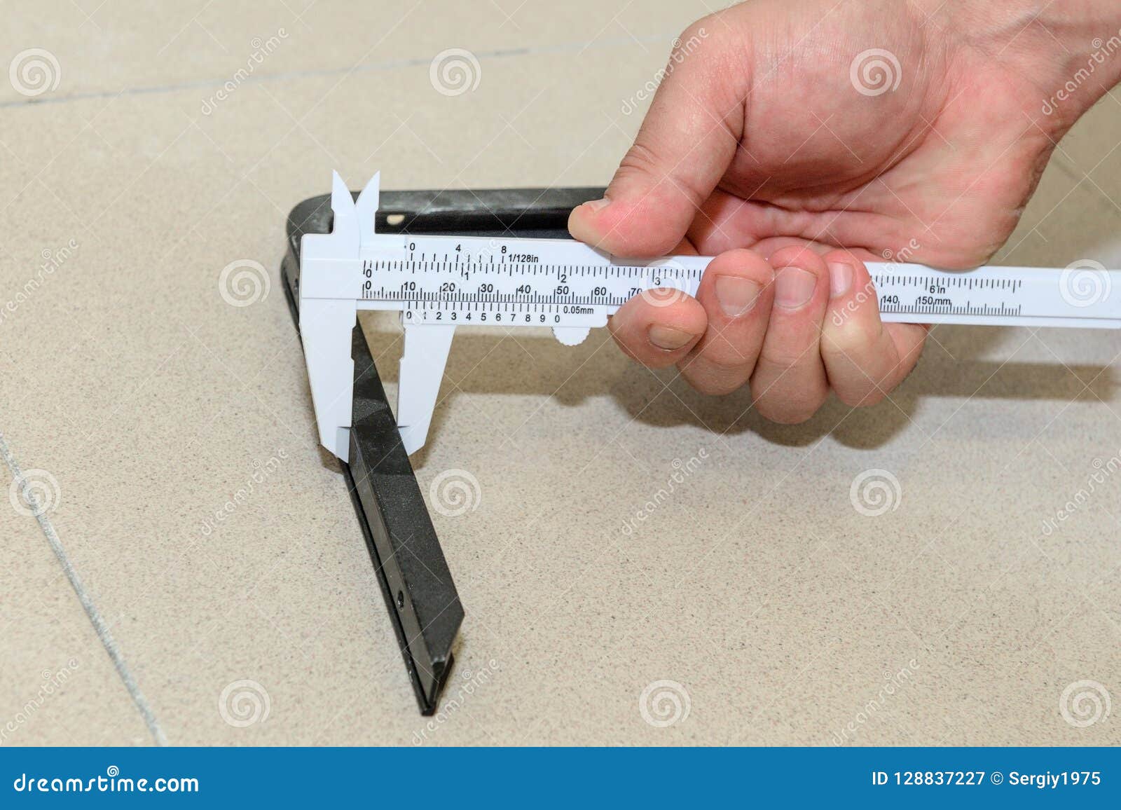 Construction Work, Worker Measure the Detail with a Caliper Stock Image ...