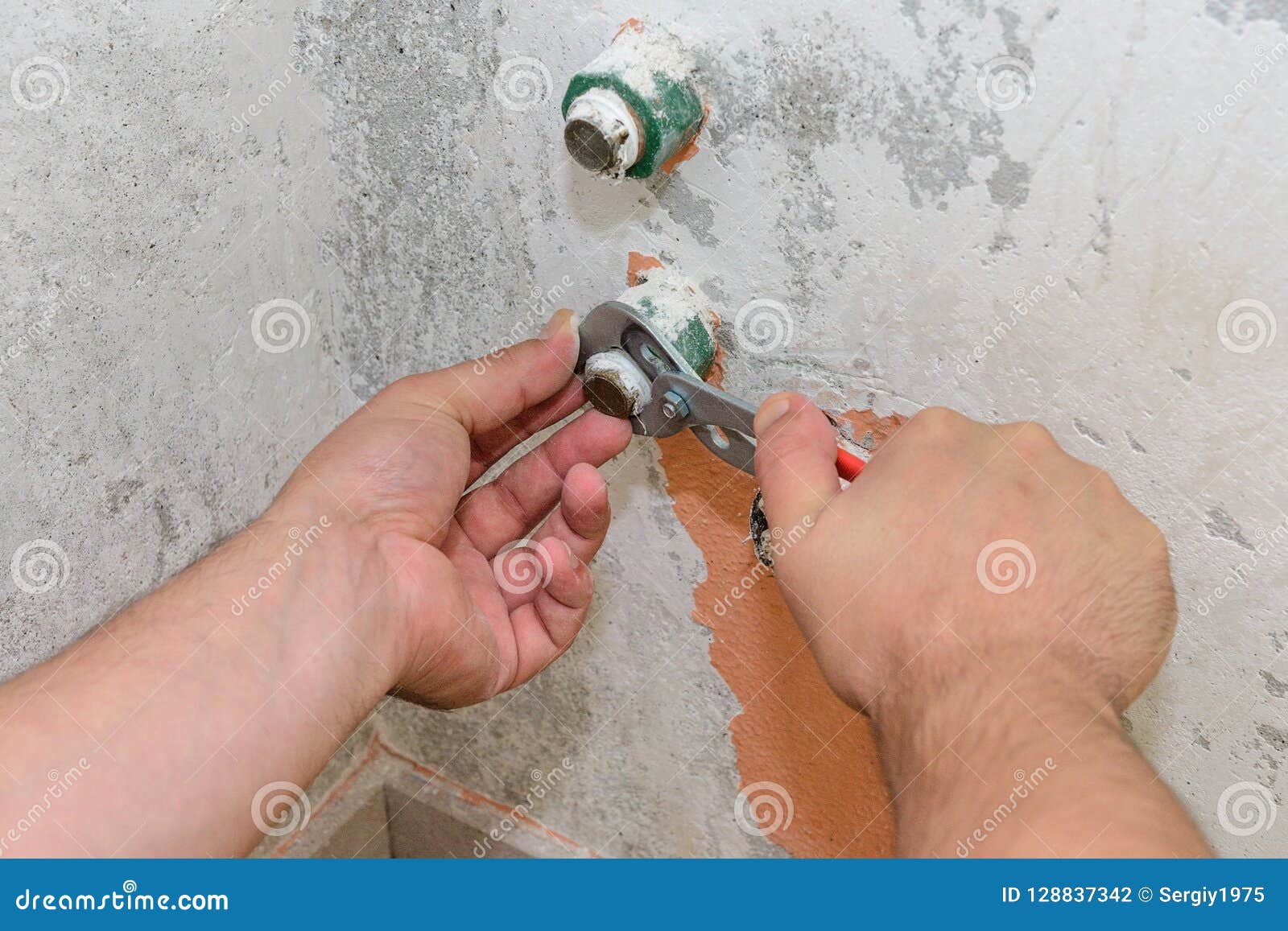 Construction Worker Plumber Twists the Pipe Stock Photo - Image of ...