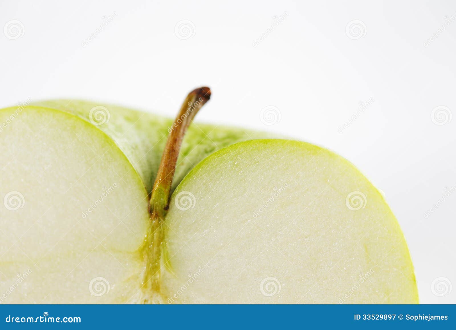 An Image of a Cross-section of a Green Apple with Stem Stock Image ...