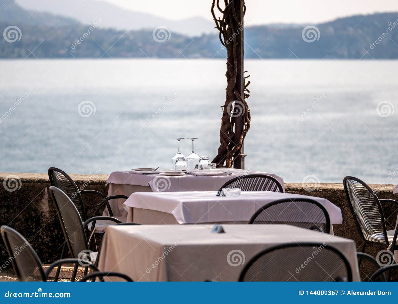 Image of Decorated Restaurant Table on a Terrace with View on Lago ...