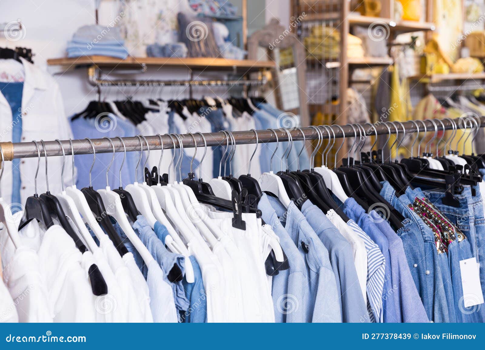 Different Colored Clothes in the Modern Shopping Centre Stock Image ...