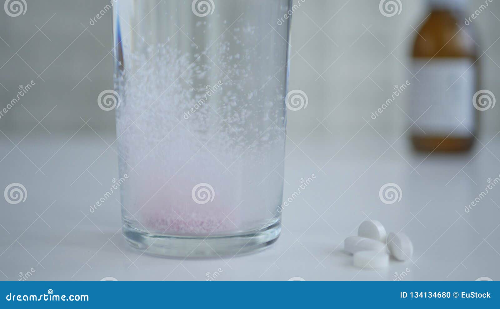 Effervescent Pill Dissolved in a Glass of Water Stock Photo - Image of ...
