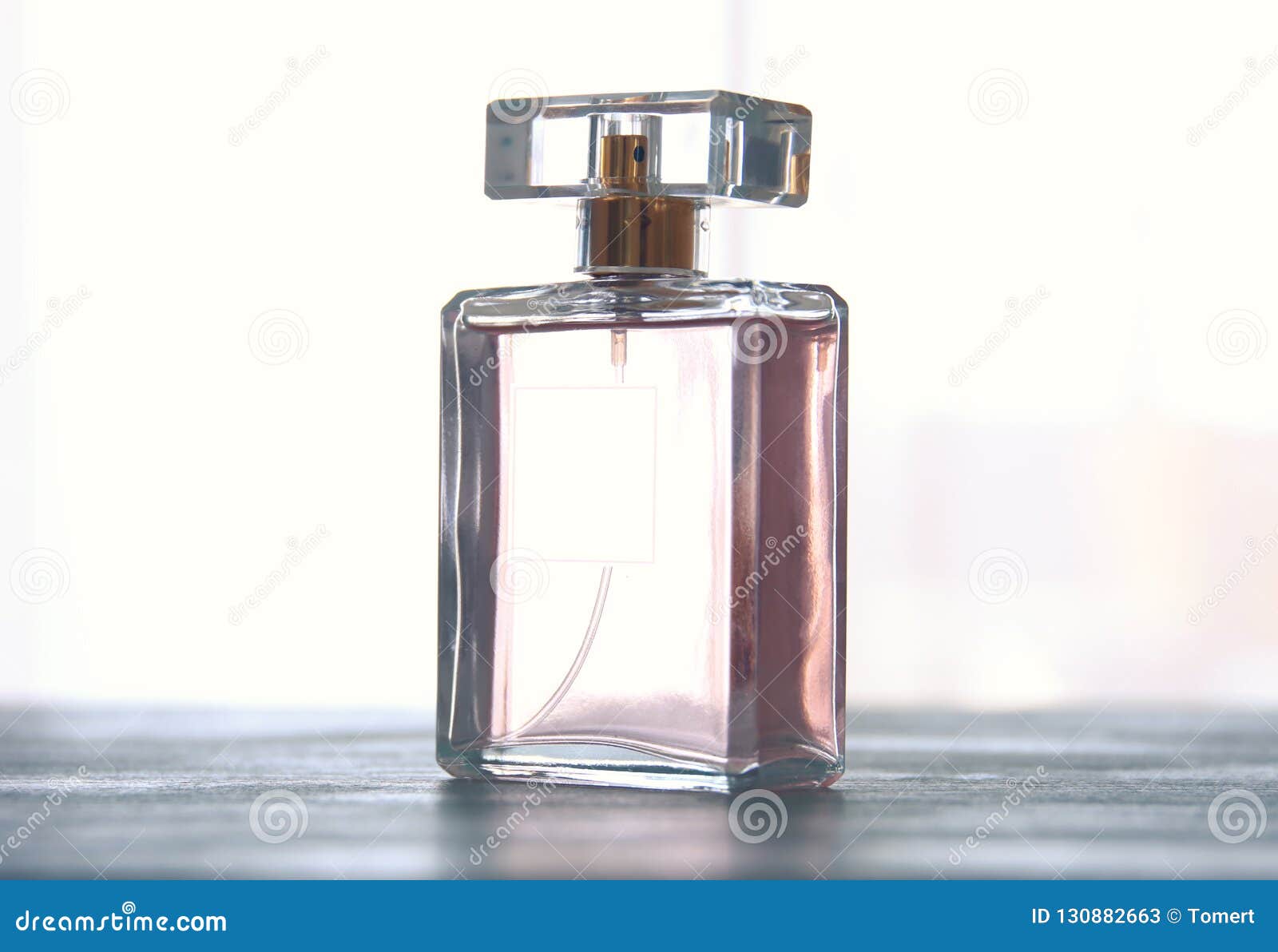Image of Elegant Perfume Bottle. Back Light Photo Stock Image - Image ...
