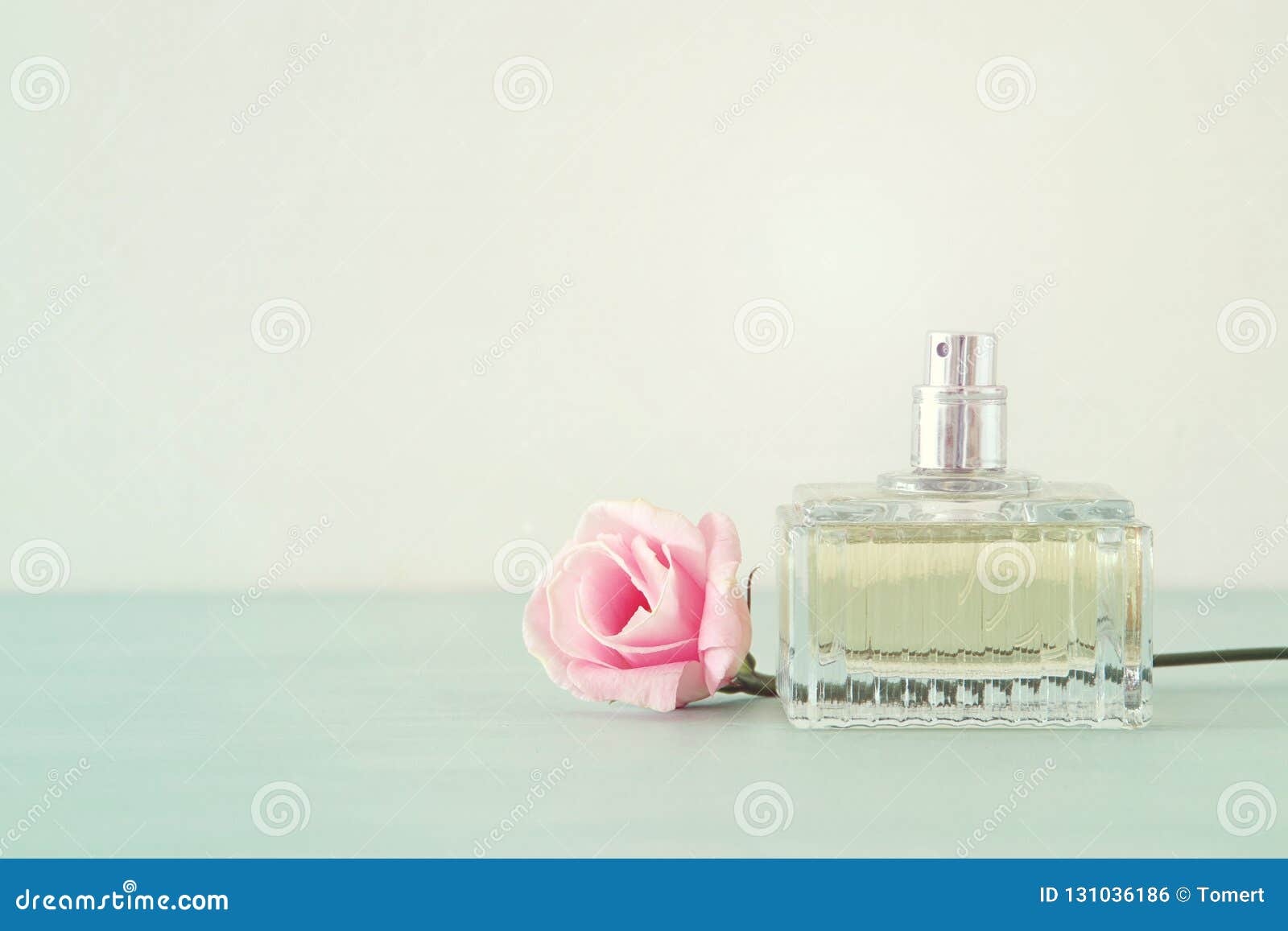 Image of Elegant Perfume Bottle. Back Light Photo. Vintage Filtered ...